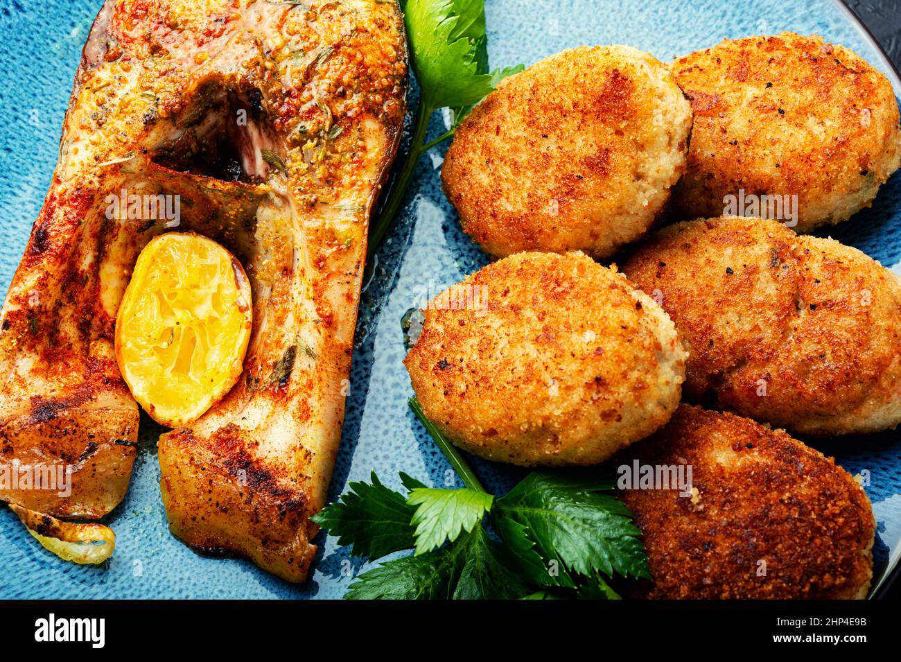 Homemade minced fish cutlets and fish steak Stock Photo - Alamy