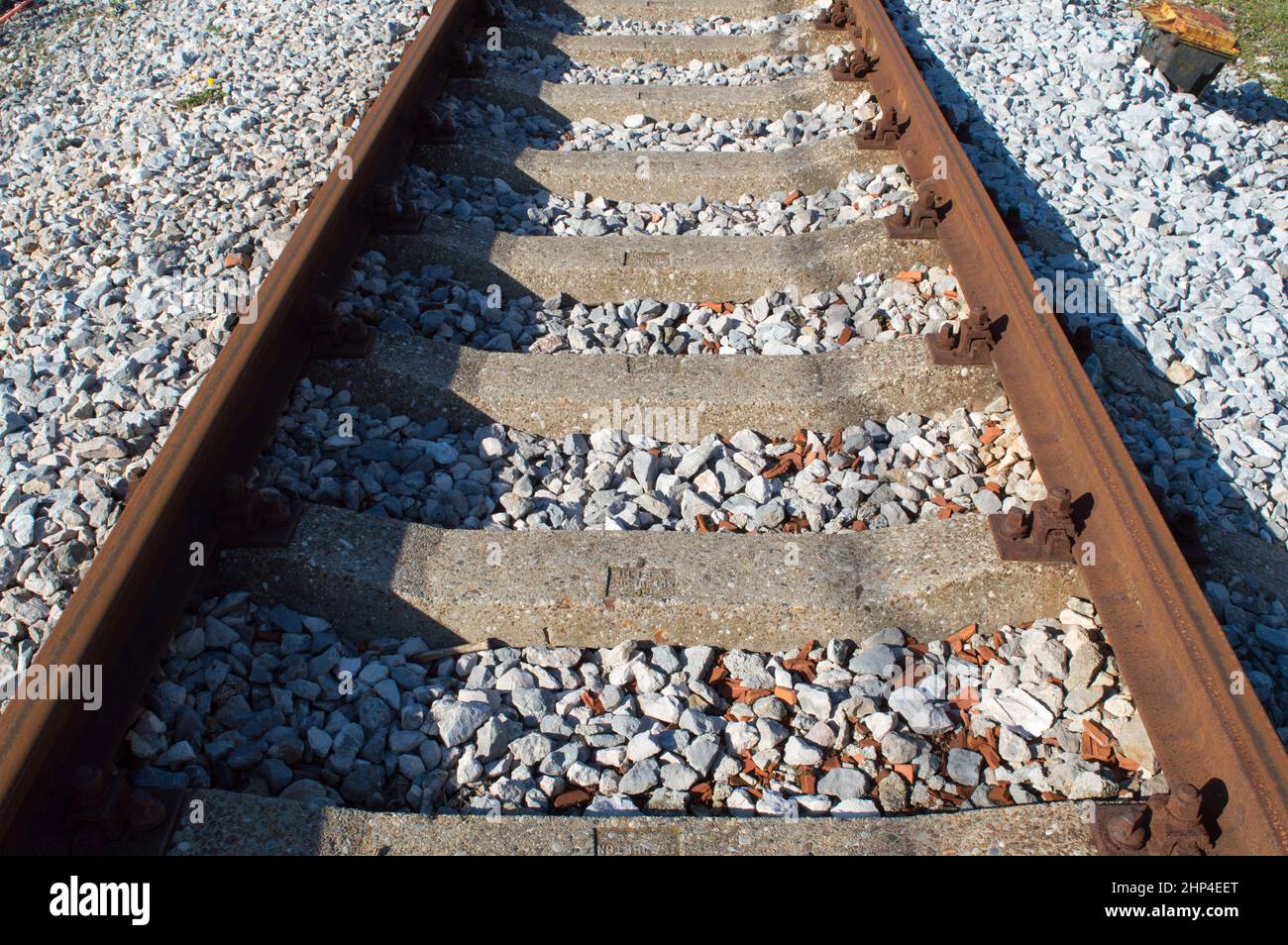 Empty railway tracks with concrete sleepers, in the countryside Stock ...