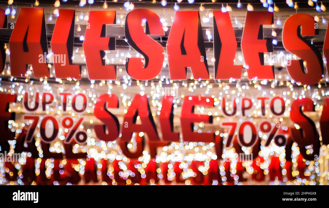 Store sale sign. Special offer banner with the red sale text gold bokeh ...