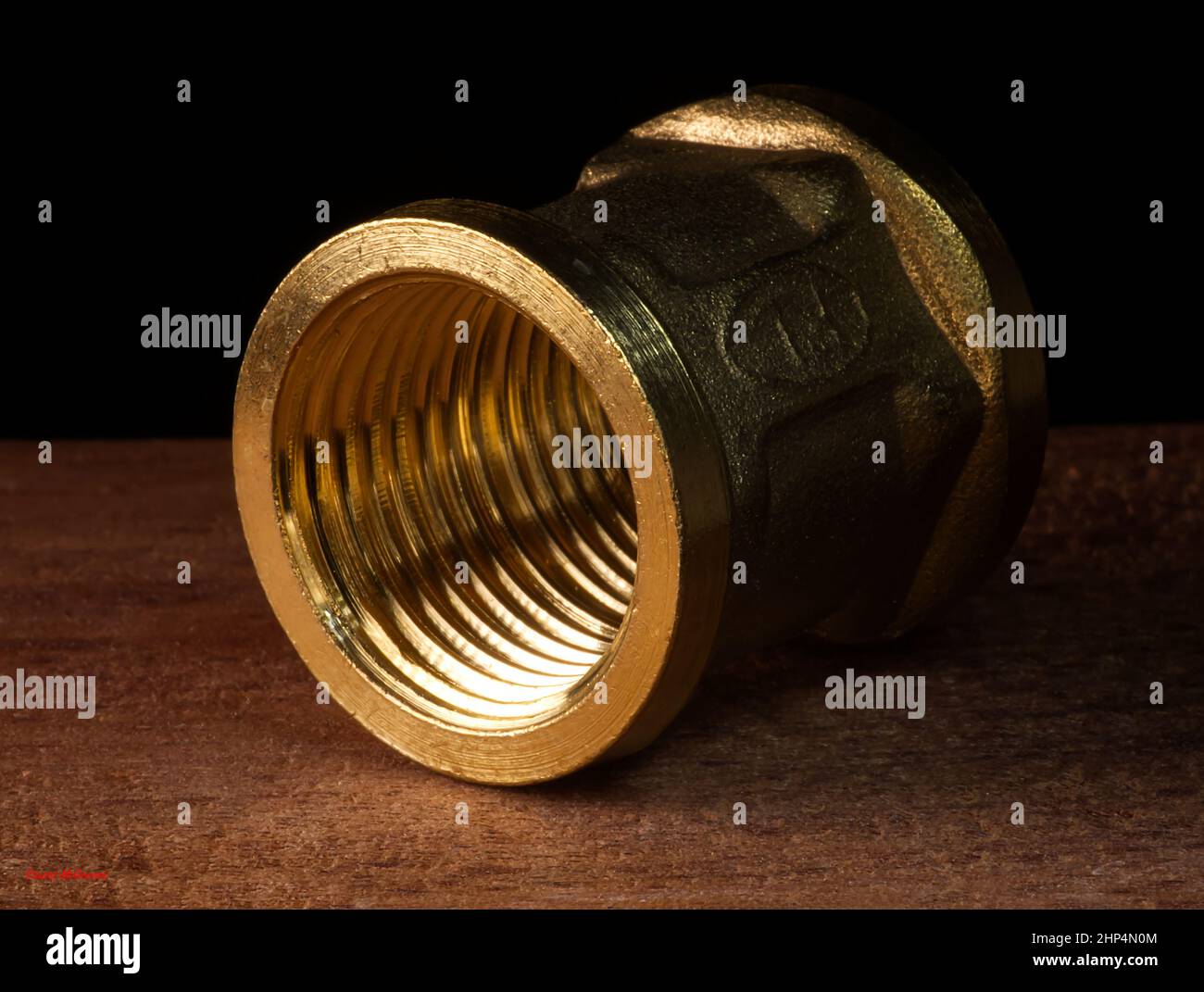 Brass 1/2 inch pipe connector Stock Photo - Alamy