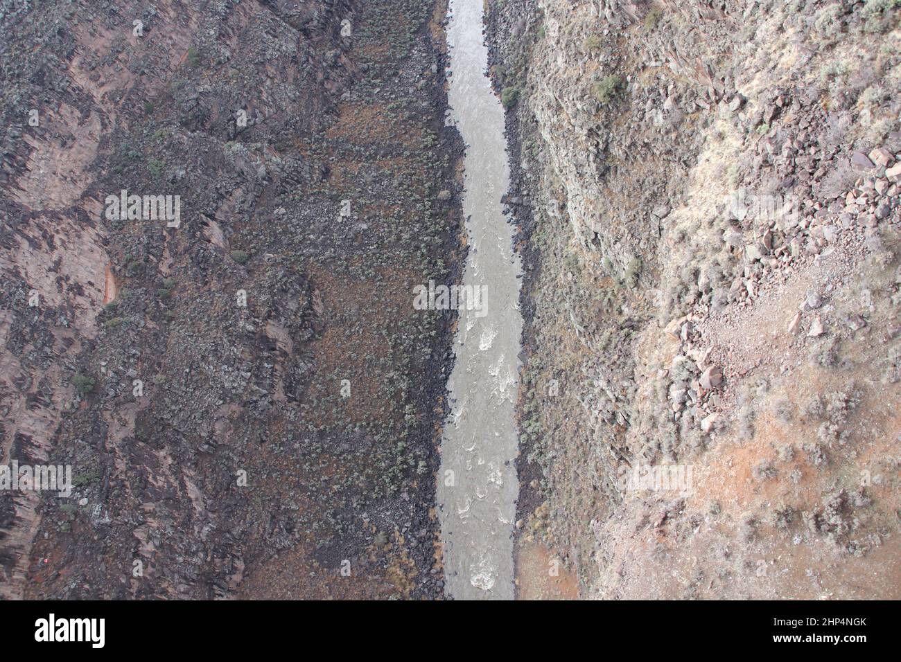 Small river flowing in a canyon surrounded by high rocky hills Stock ...