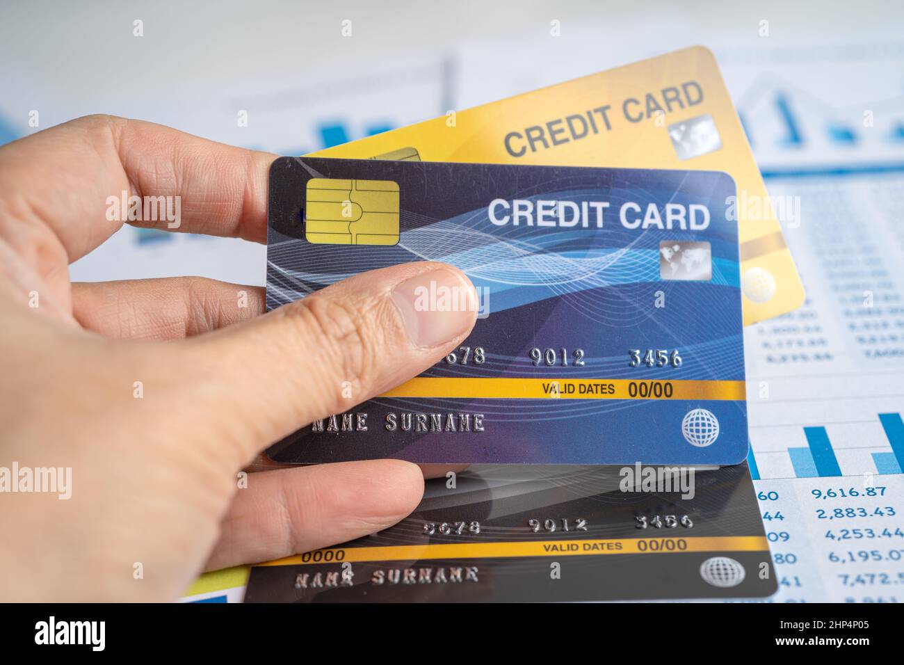 Credit card on chart and graph paper. Finance development, Banking ...