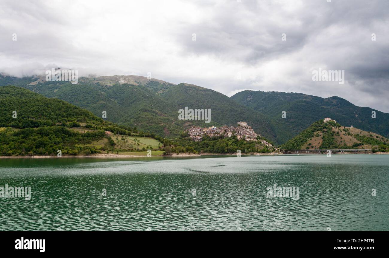 Landscape of Lake Turano and little town Castel di Tora and Borgo Monte ...