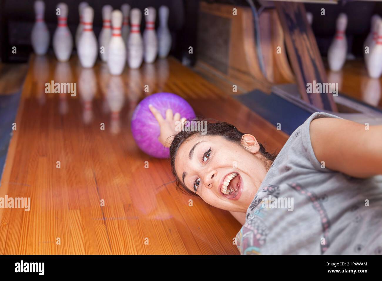 Woman sliding down hi-res stock photography and images - Alamy
