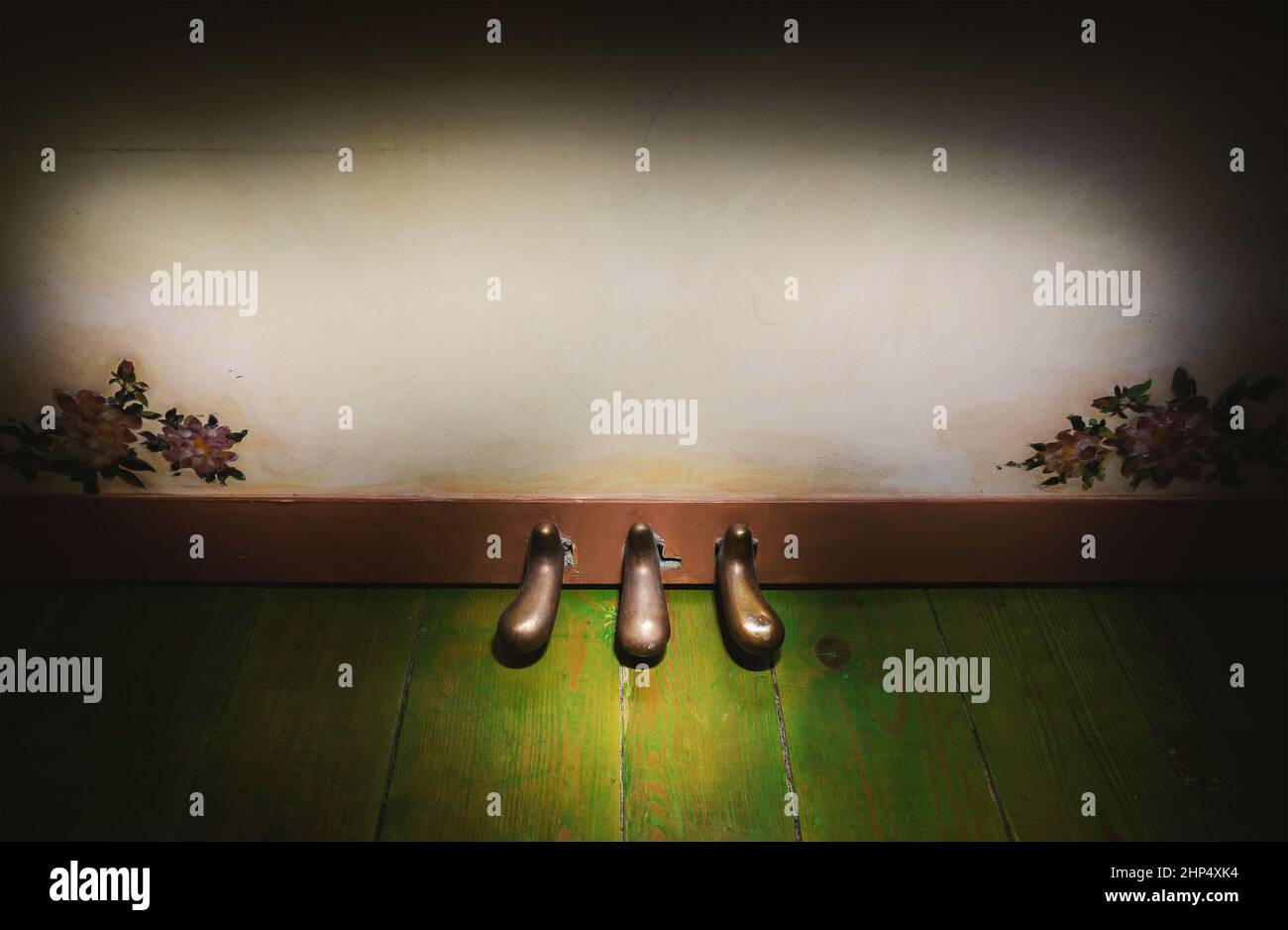 Closeup view on upright piano foot pedals on green wooden floor Stock ...