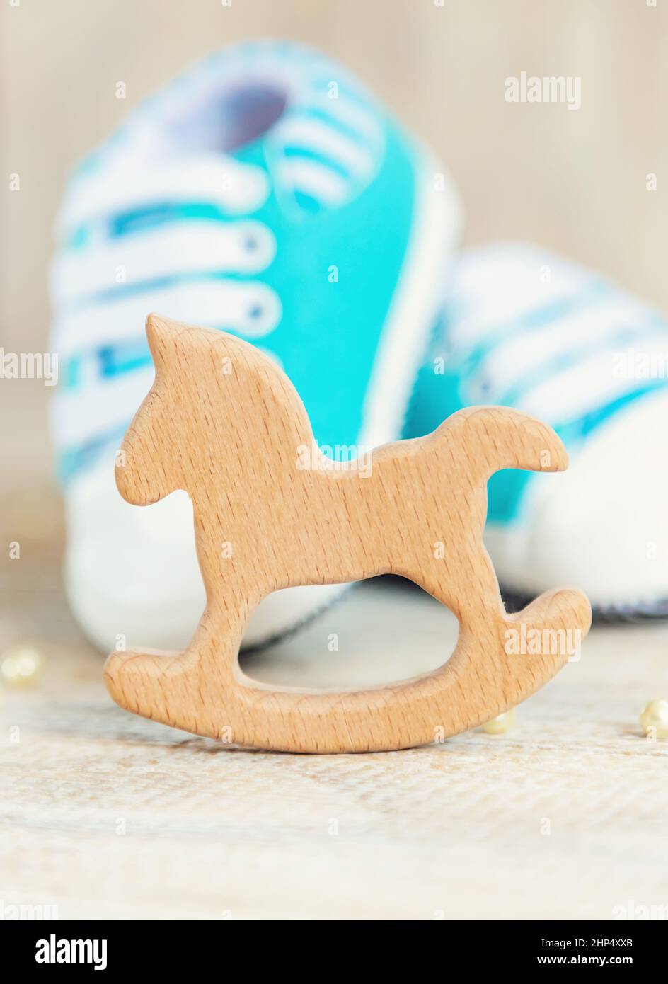 Baby booties accessories on a white background. People Stock Photo - Alamy