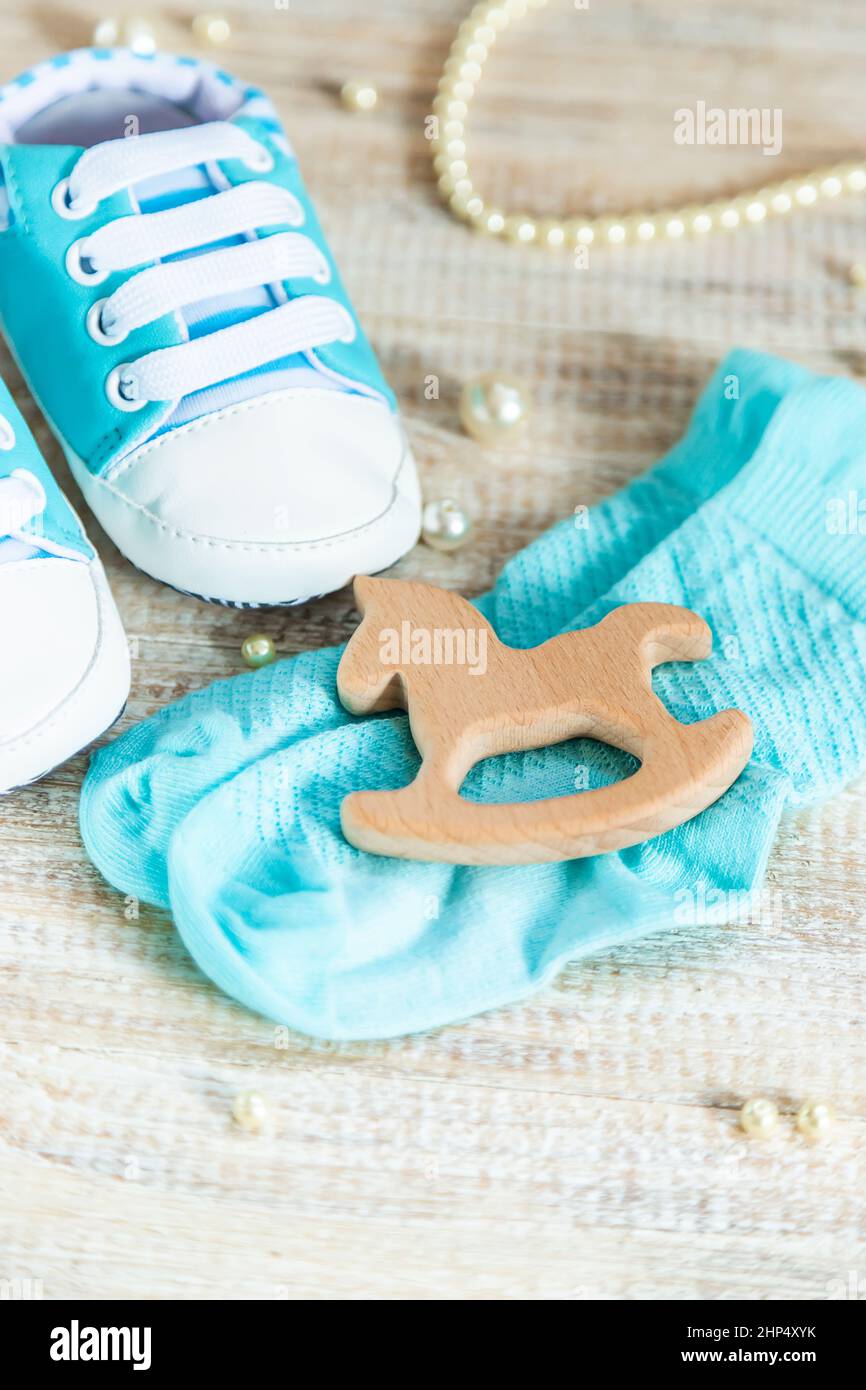 Baby booties accessories on a white background. People Stock Photo - Alamy