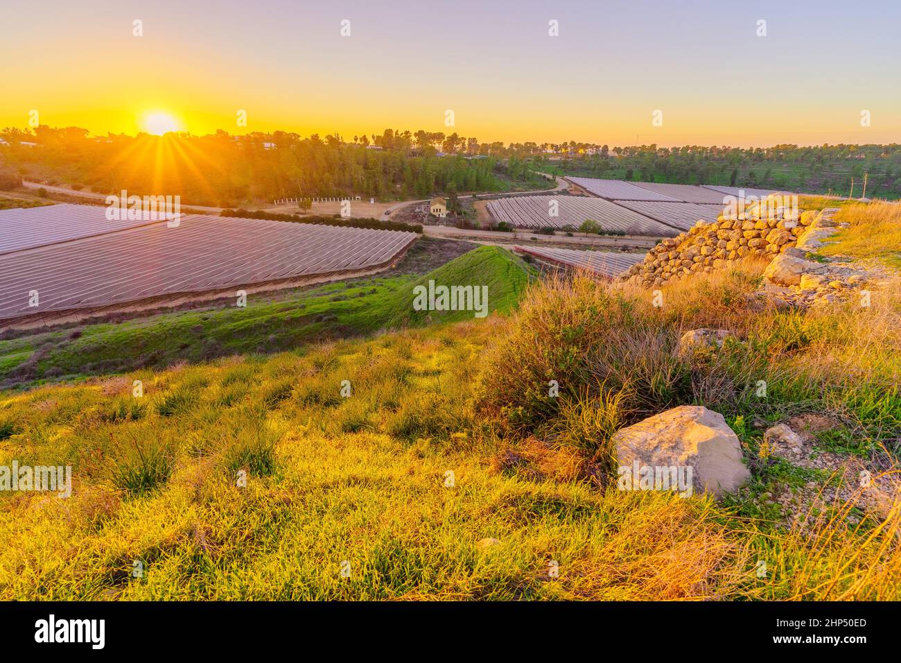 Sunset view of ancient ruins and countryside in Tel Lachish, the ...
