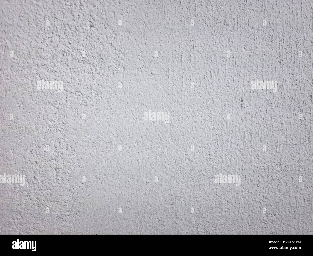 white plaster wall texture useful as a background Stock Photo - Alamy