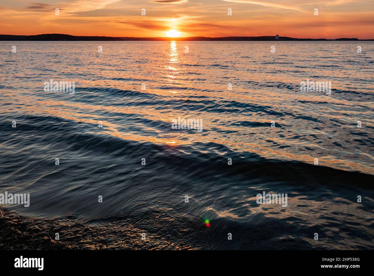 Reflection suns rays in blue hi-res stock photography and images - Alamy