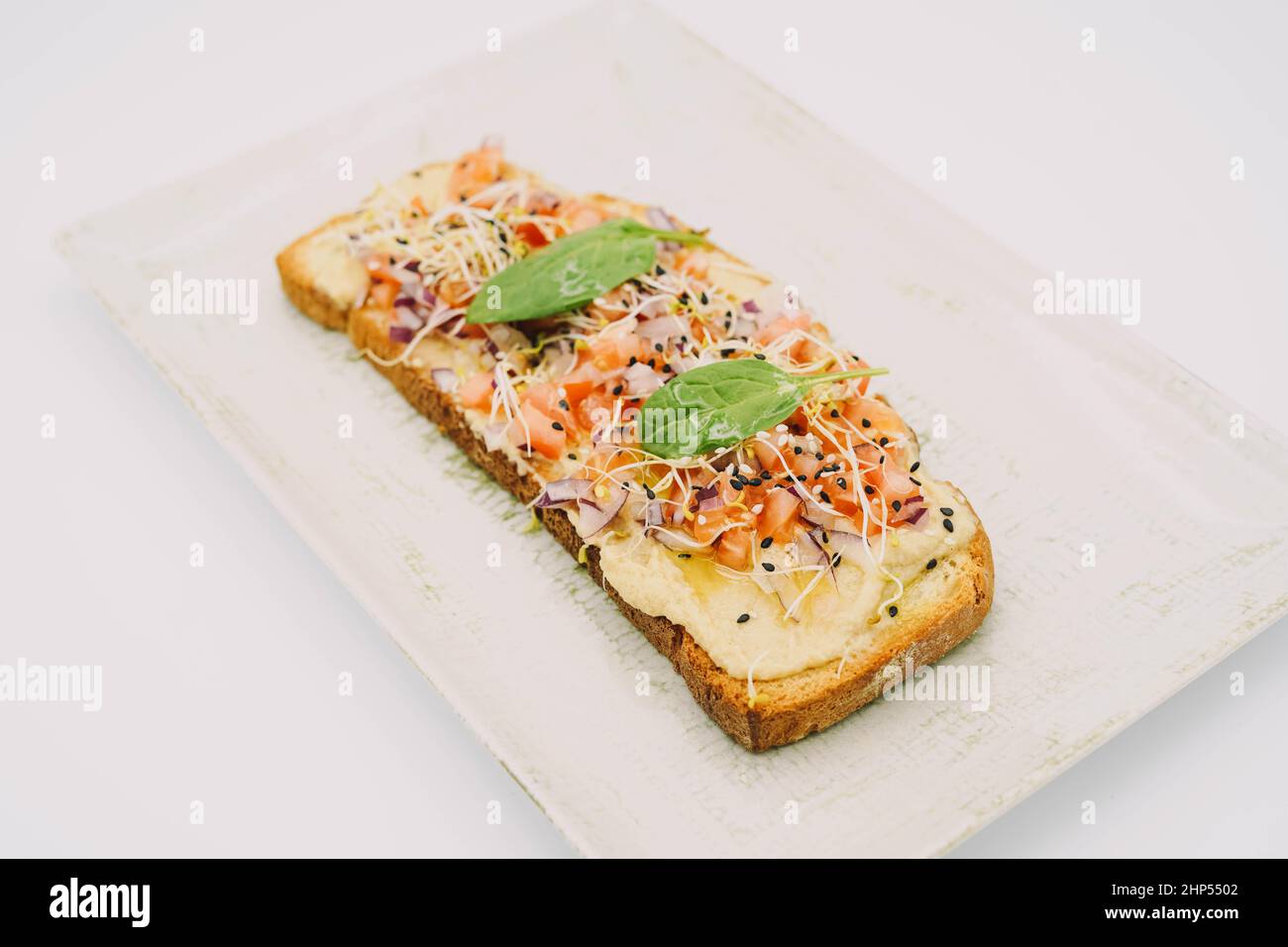 Toast avocado tomato basil hi-res stock photography and images - Alamy