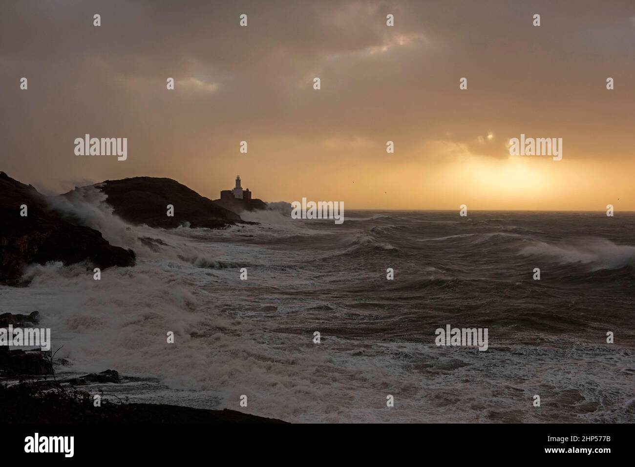 Swansea, UK. 18th Feb, 2022. Huge waves smash into Langland Bay on the ...