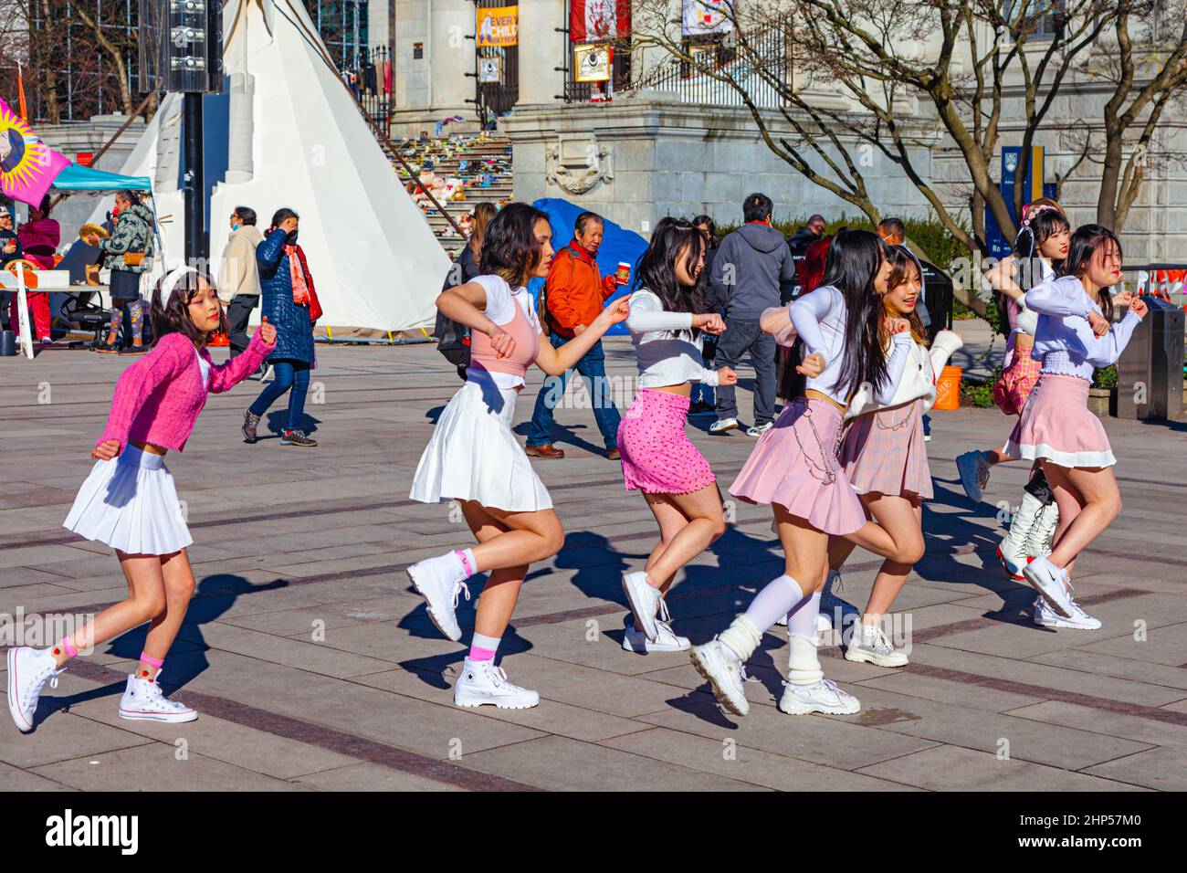 Asian girl dance troupe performimg and posing at Robson Square in ...