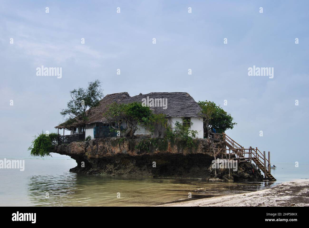 Restaurant on small rock island in Zanzibar Tanzania Stock Photo - Alamy