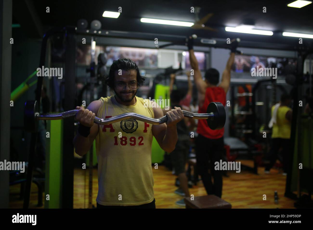 Men in gym Stock Photo - Alamy