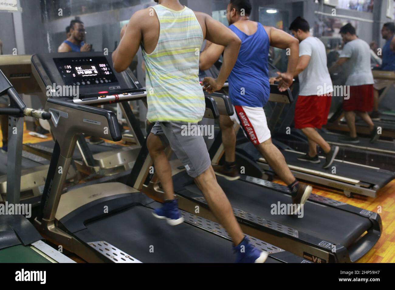 Men in gym Stock Photo - Alamy