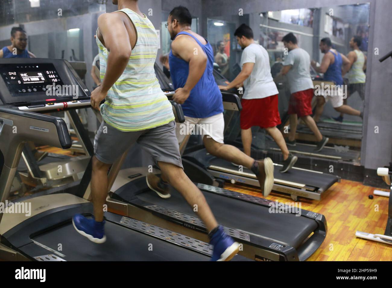Men in gym Stock Photo - Alamy