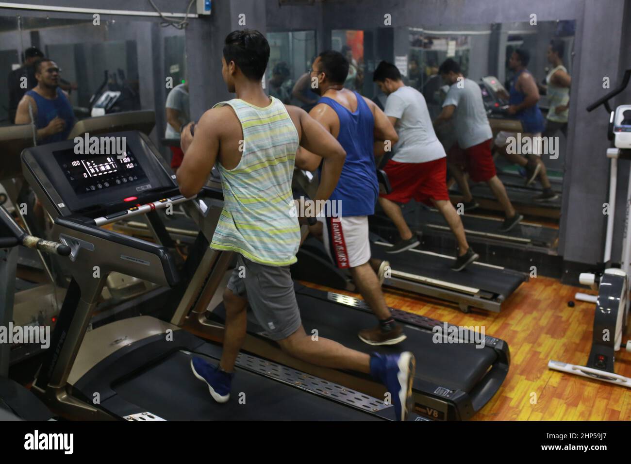 Men in gym Stock Photo - Alamy