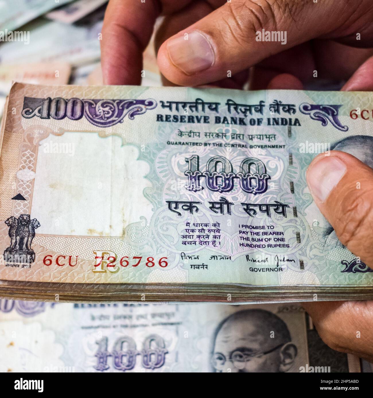 Old One Hundred Rupee notes combined on the table, India money on the ...
