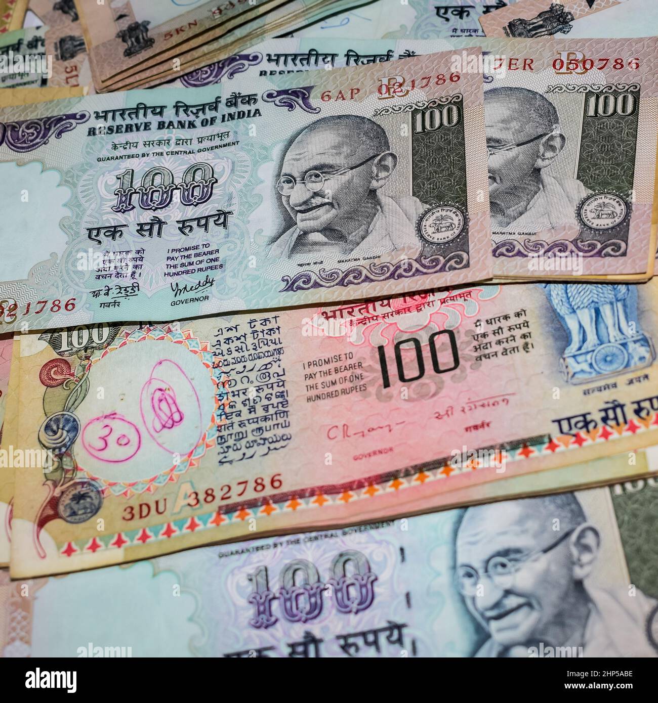 Old One Hundred Rupee notes combined on the table, India money on the ...