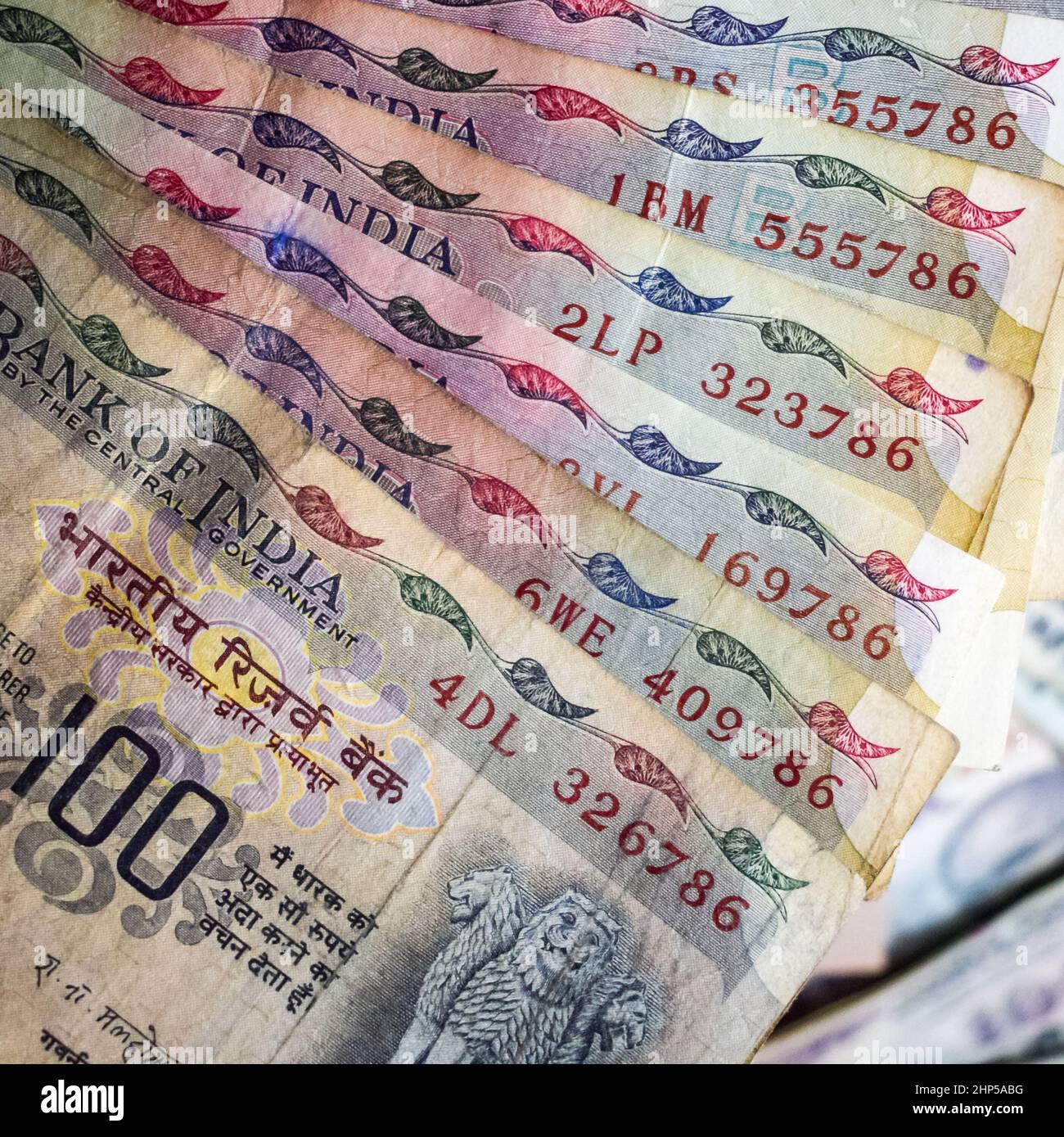 Old One Hundred Rupee notes combined on the table, India money on the ...