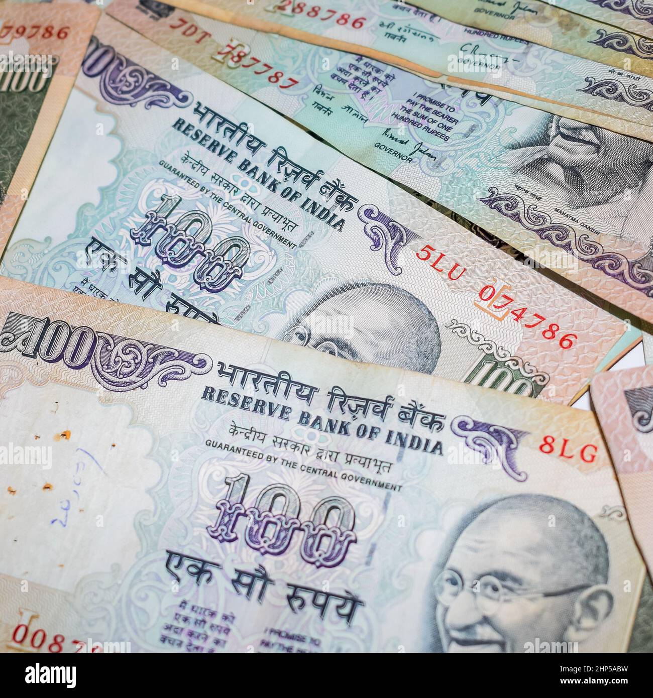 Old One Hundred Rupee notes combined on the table, India money on the ...