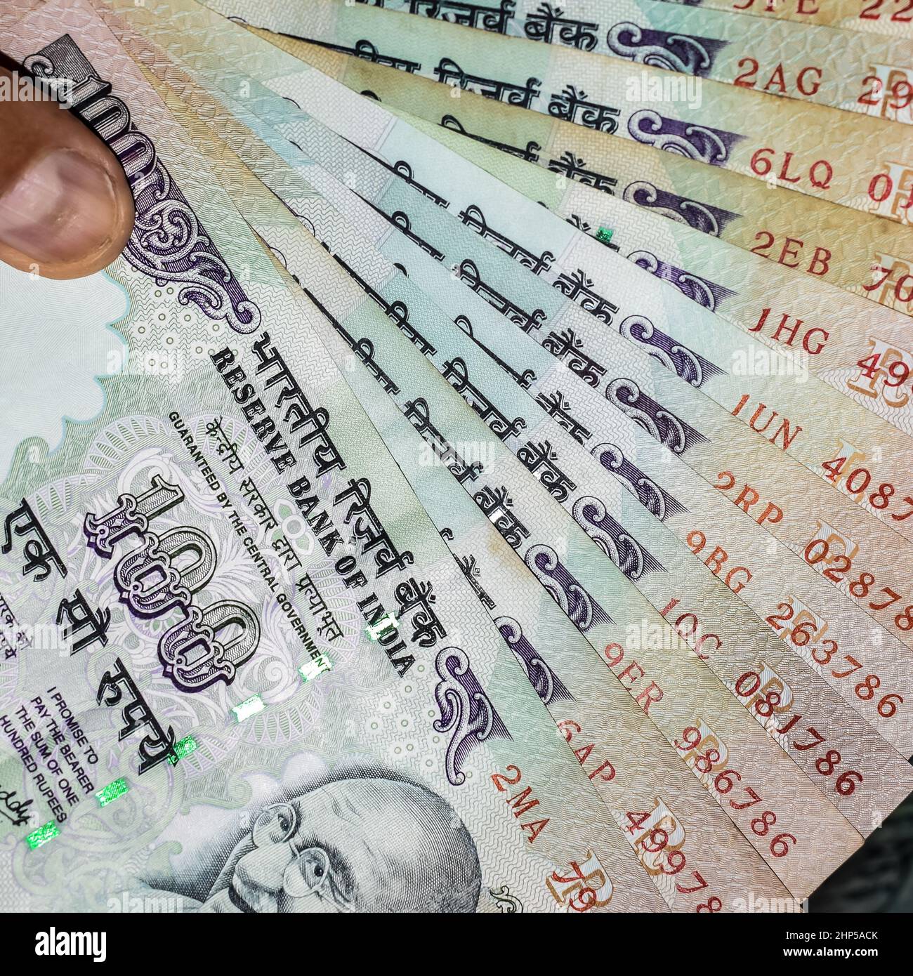 Old One Hundred Rupee notes combined on the table, India money on the ...