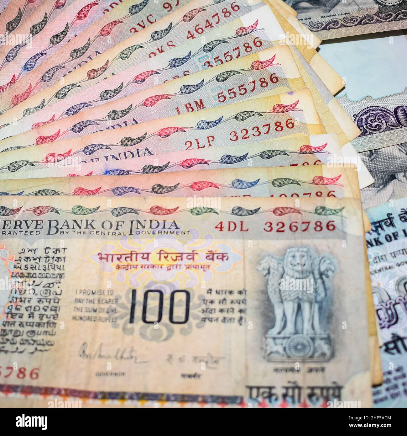 Old One Hundred Rupee notes combined on the table, India money on the ...