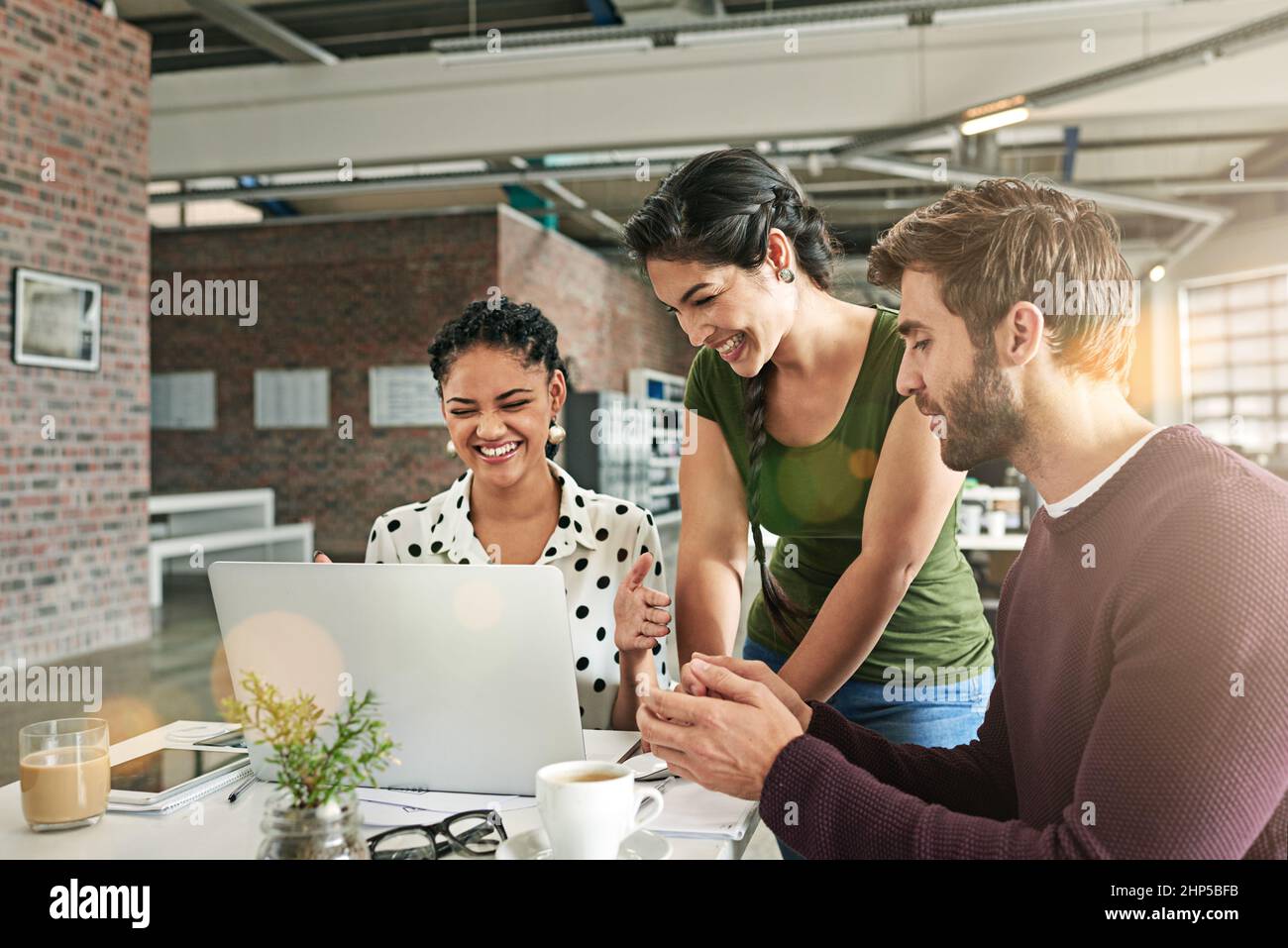 Easier problem solving thanks to technology. Shot of a team of ...