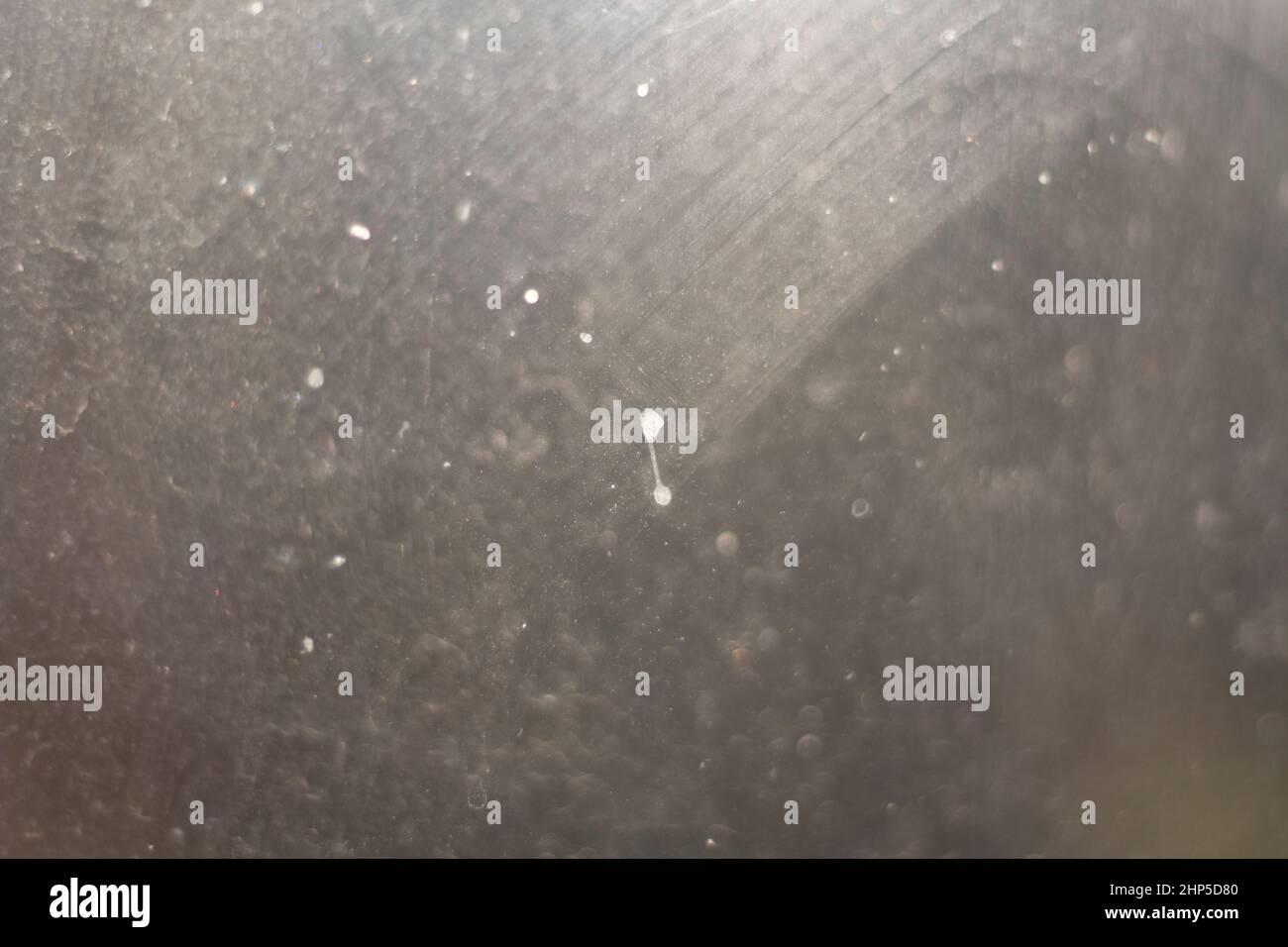 Dirt on glass. Texture of cloudy glass. Dusty window. Plaque on surface ...
