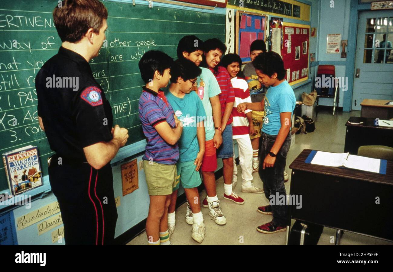 Police officer in elementary school classroom hi-res stock photography ...