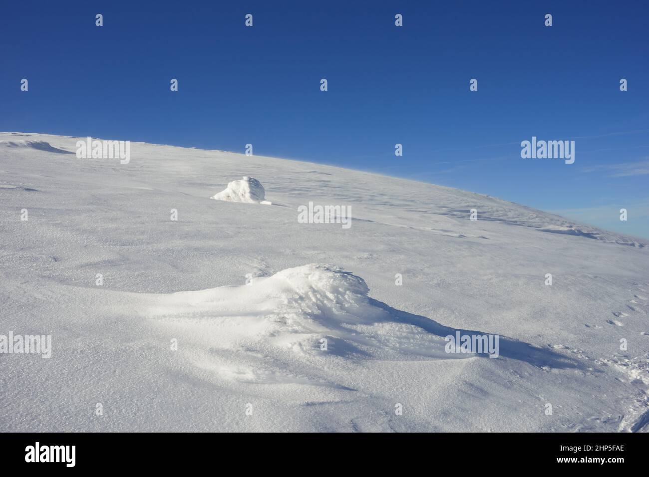 Detail of winter nature - surface is covered by snow and ice, snowdrift ...