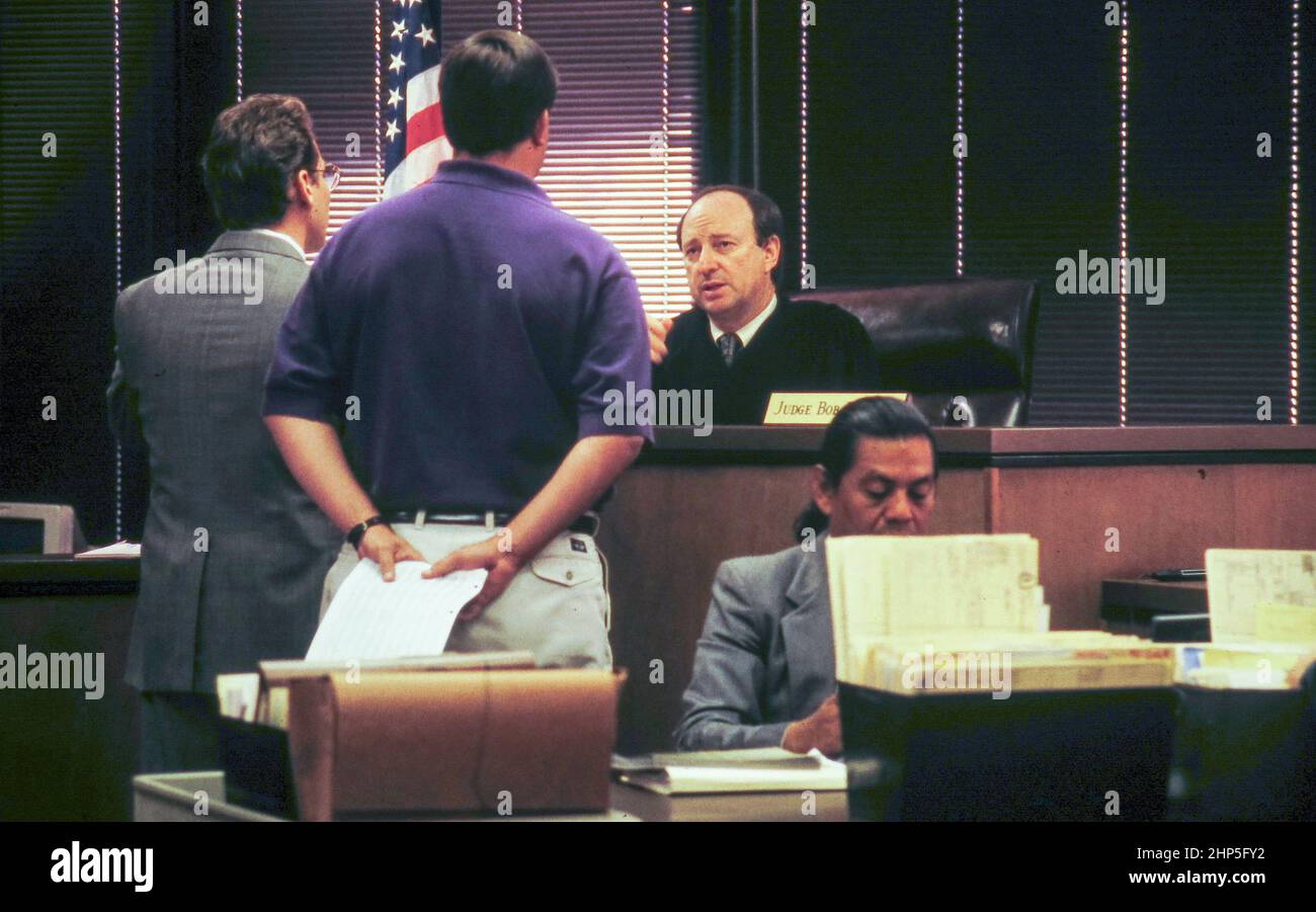 Lawyer talking to client court hi-res stock photography and images - Alamy