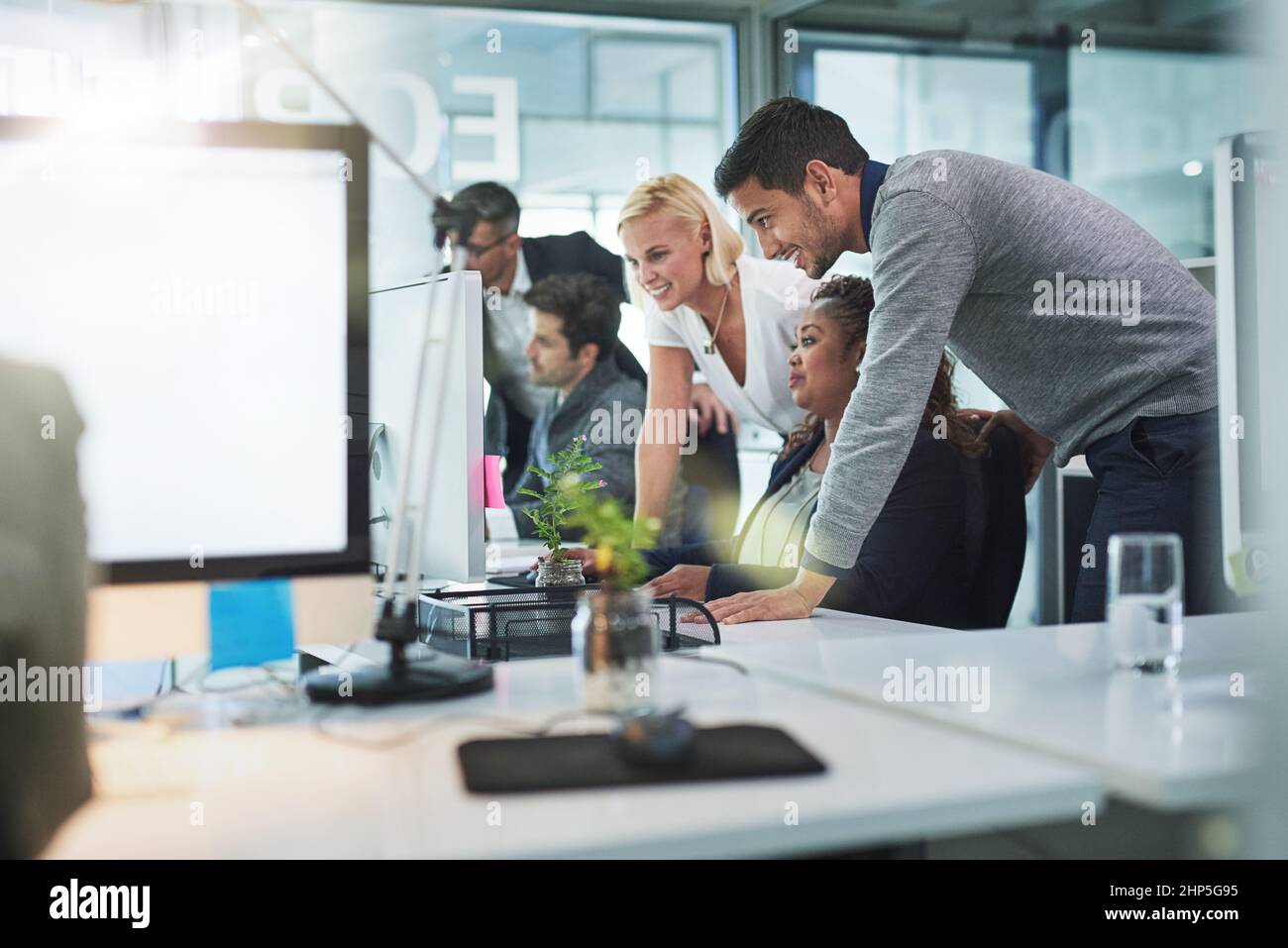 Success is the product of teamwork. Shot of corporate colleagues ...