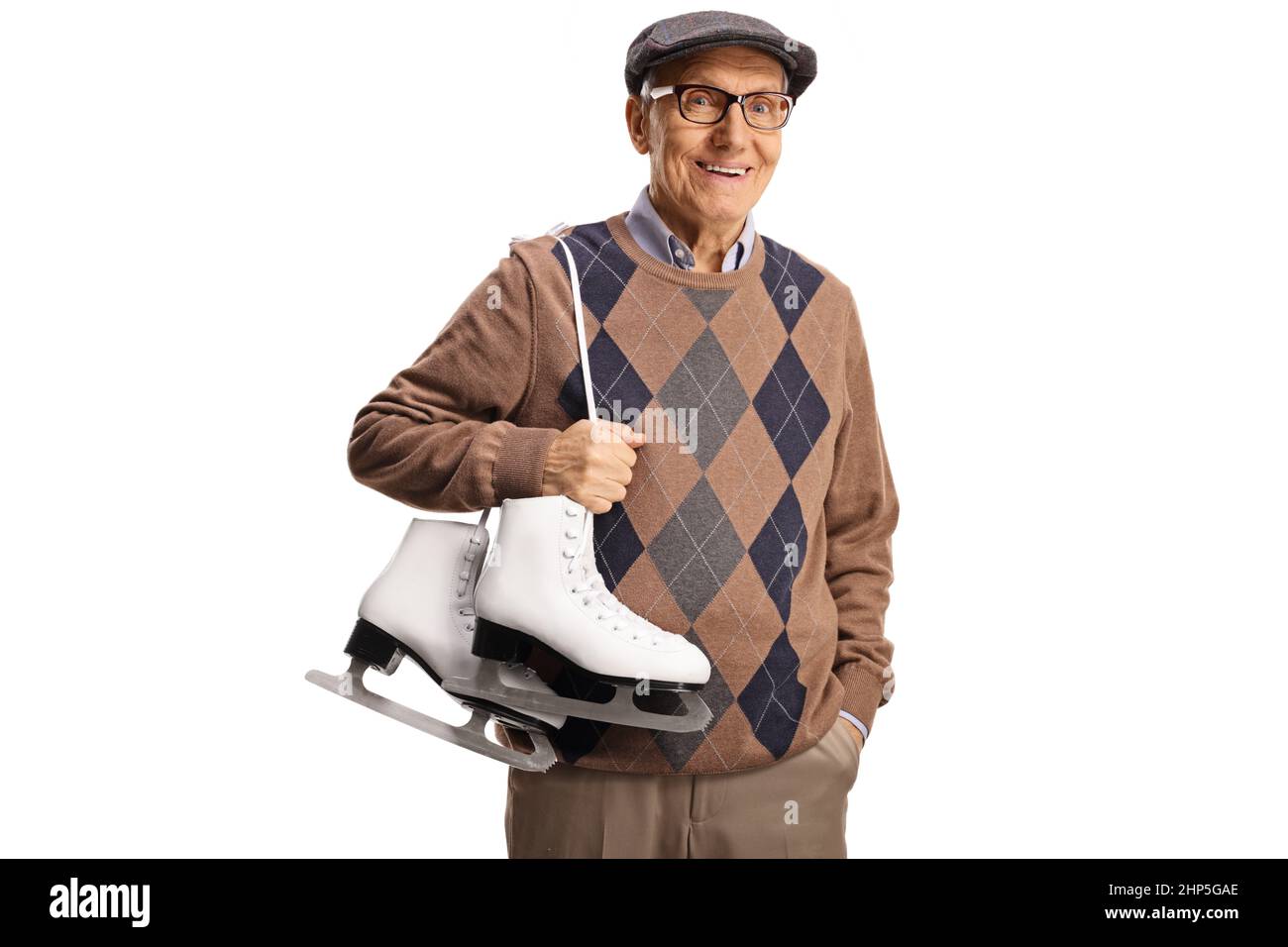 Elderly man carrying ice-skates on his shoulder and smiling isolated on ...