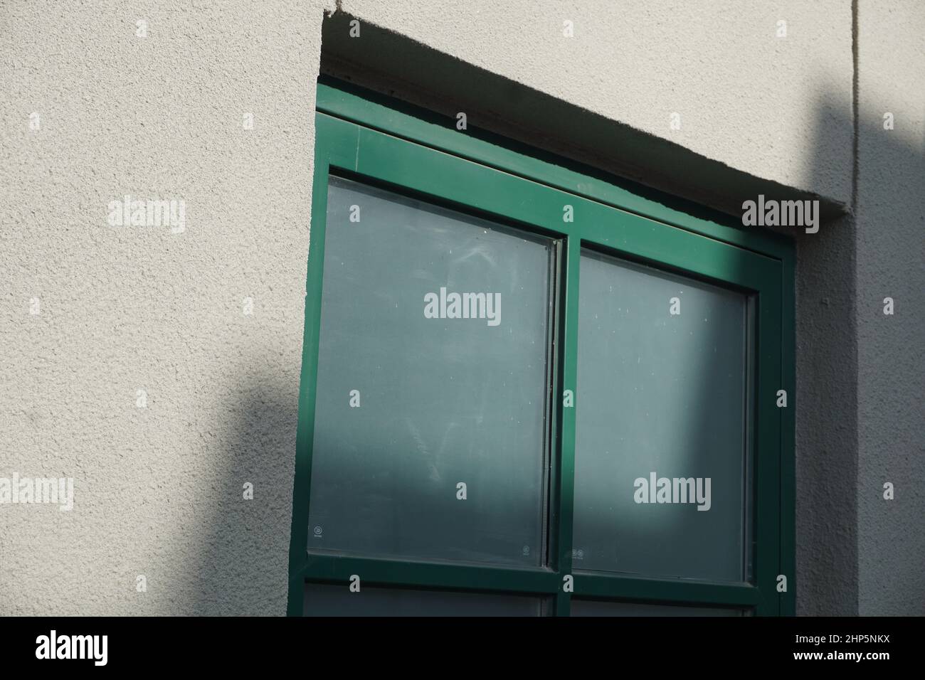 Green window of a building Stock Photo - Alamy
