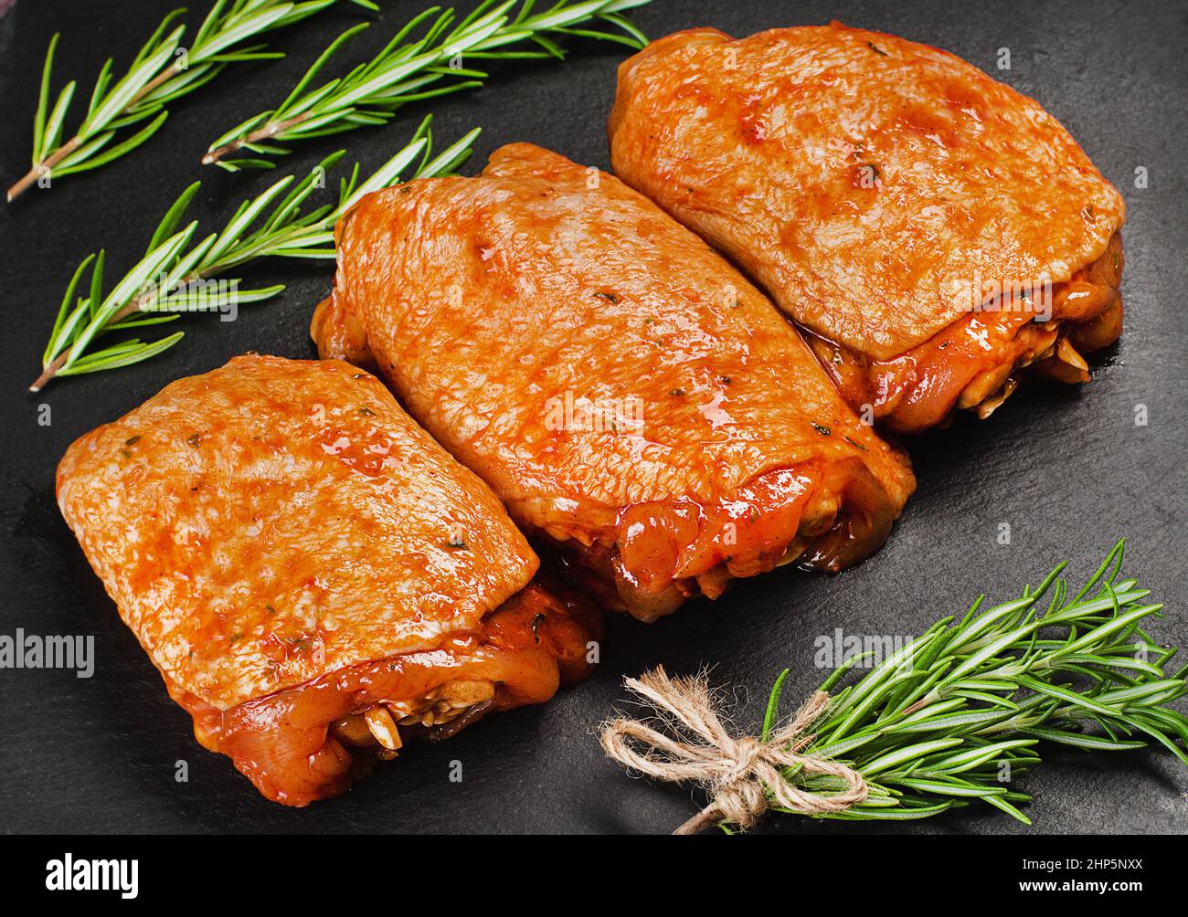 Background for a banner of chicken thighs with spices.Raw Marinated ...