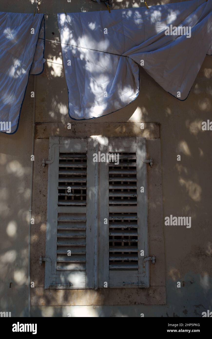 Sheets hanging on washing line from a window, Perast, Montenegro Stock ...