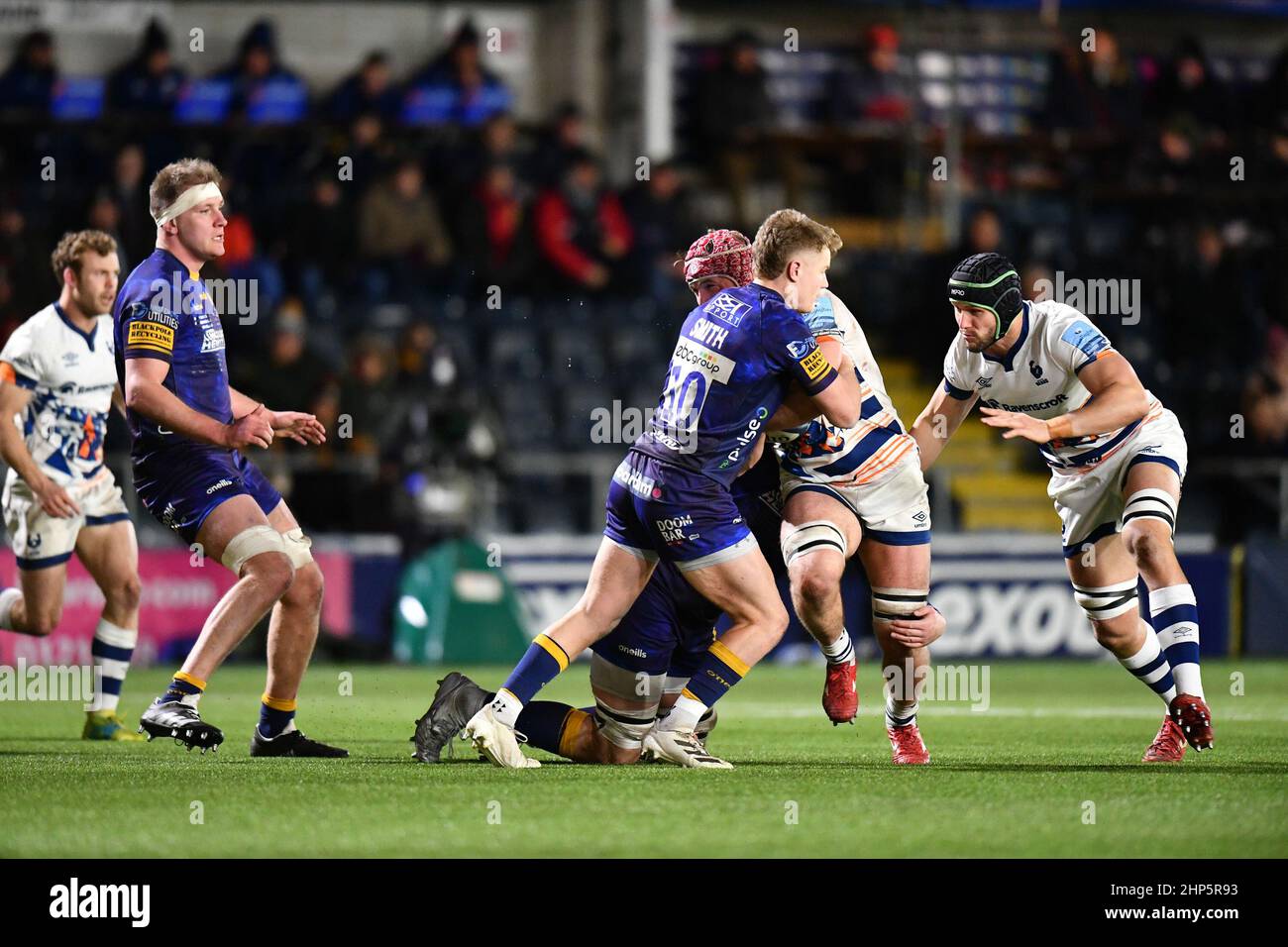 Worcester, UK. 18th Feb, 2022. Ed Holmes of Bristol Bears gets tackled ...