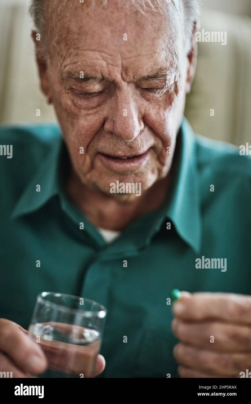 Managing his chronic condition to stay healthy. Cropped shot of a ...