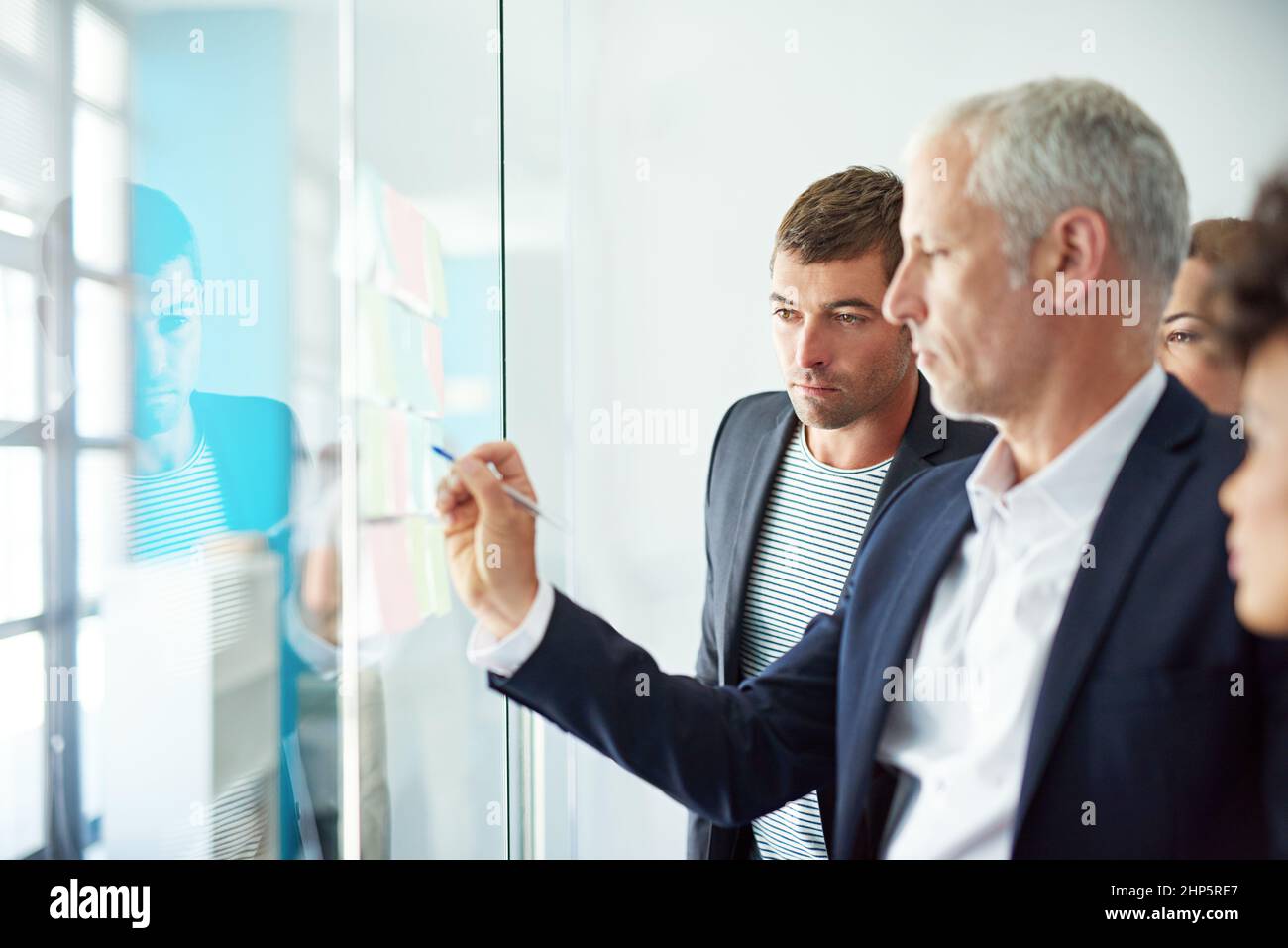 Theyve got equal participation on this project. Shot of a group of ...