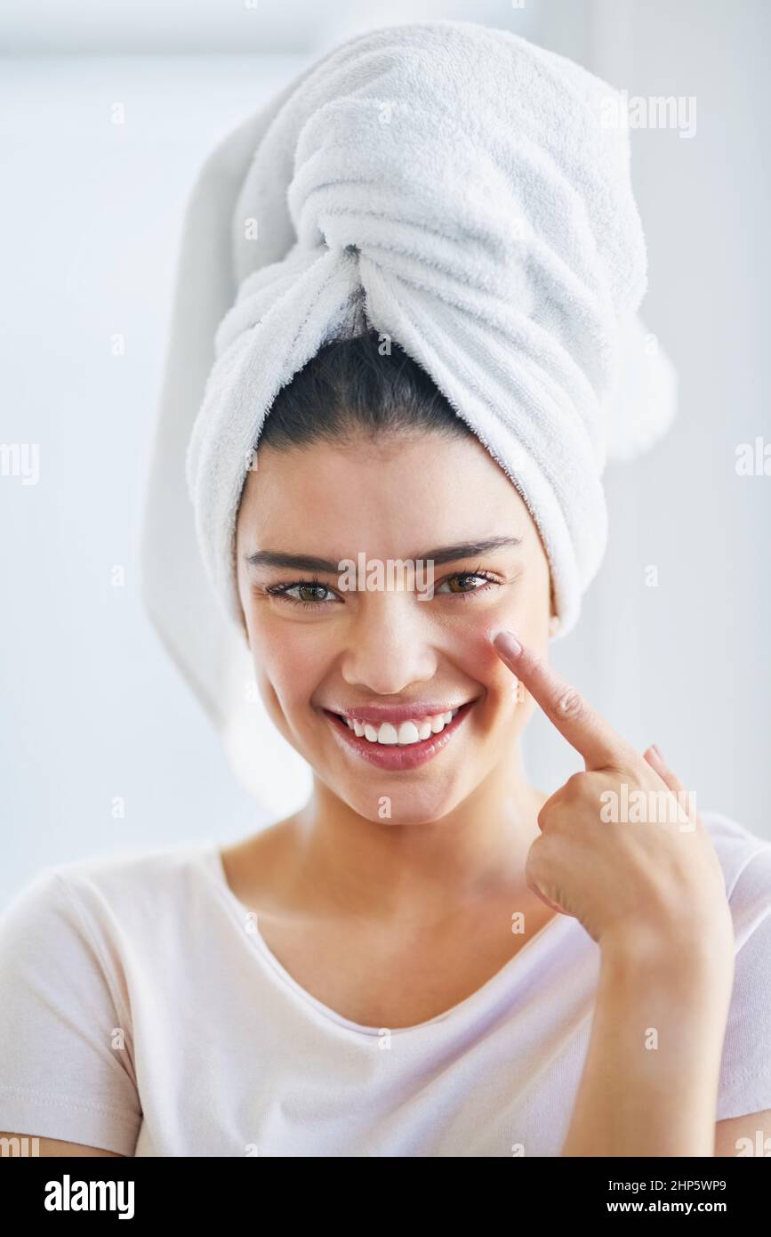 Give your skin the moisture it needs. Portrait of a beautiful young ...