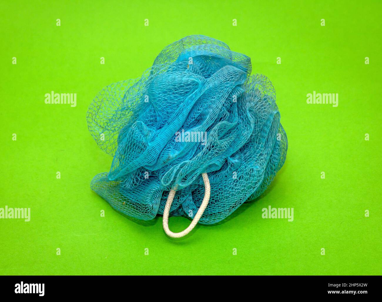 Net material sponge for exfoliating skin while taking a shower Stock ...