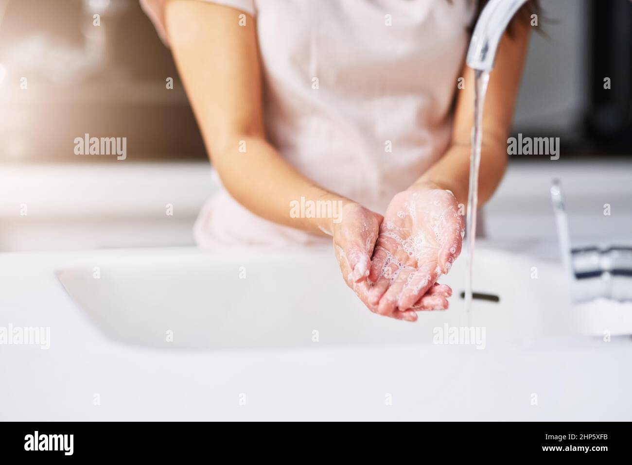 Practice good hygiene. Closeup shot of an unrecognizable woman washing her hands Stock Photo - Alamy