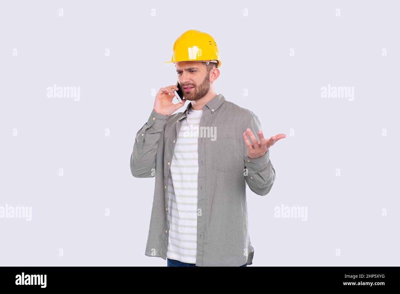 Angry construction worker holding hi-res stock photography and images ...