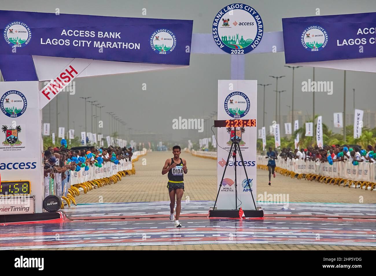 An athlete crosses the finish line in the Access Bank Lagos City ...