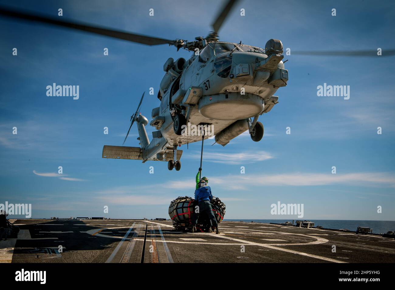 Seaman Dylan Jeffers (in blue) and Aviation Structural Mechanic Airman ...