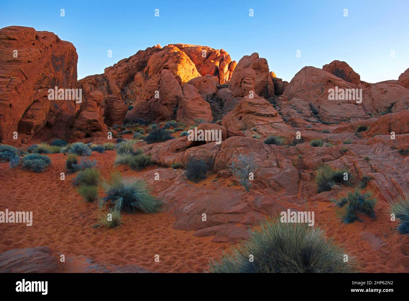 Dry sandy area and rocks Stock Photo - Alamy