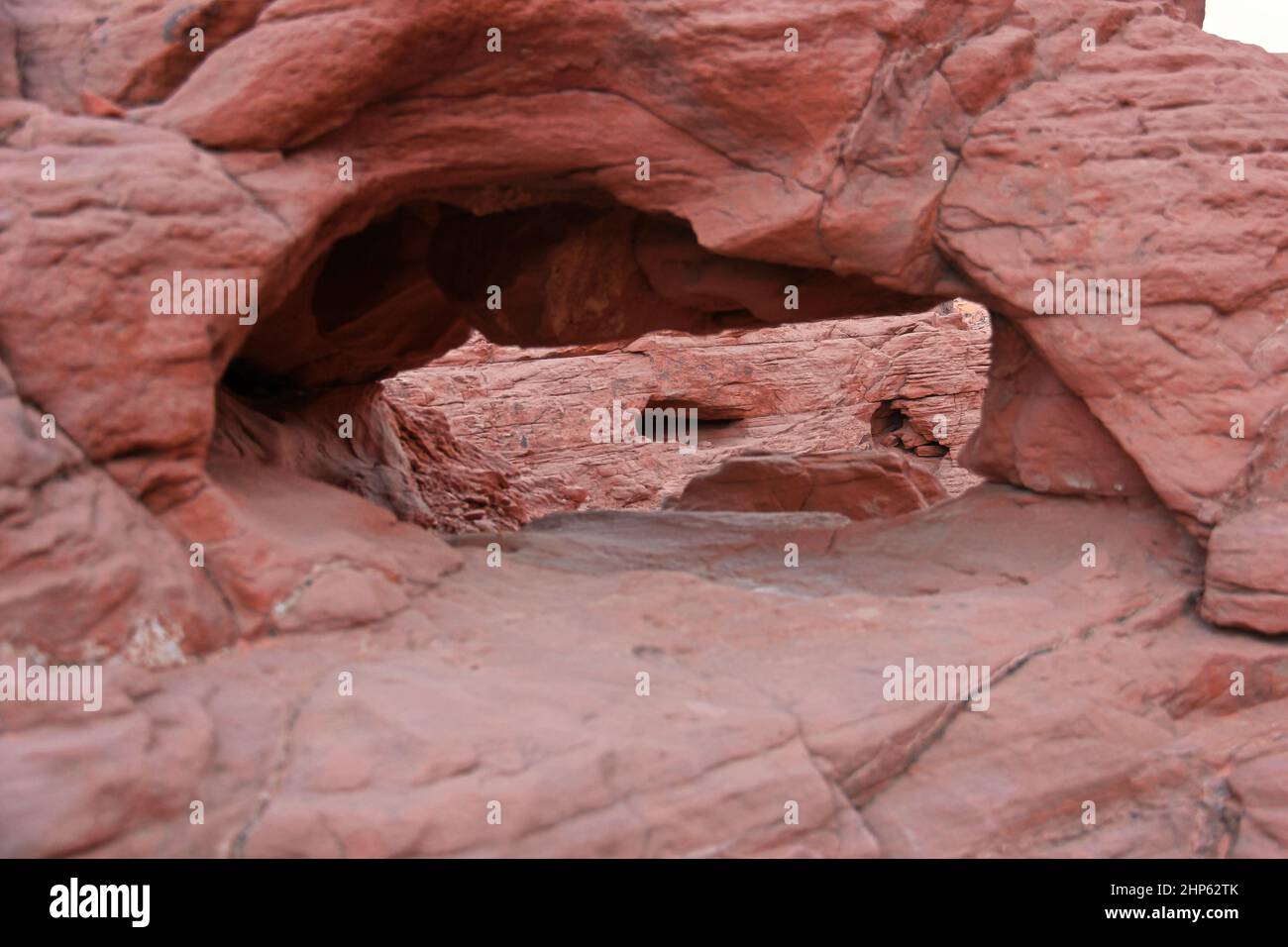Shot of red caves and rocks Stock Photo - Alamy