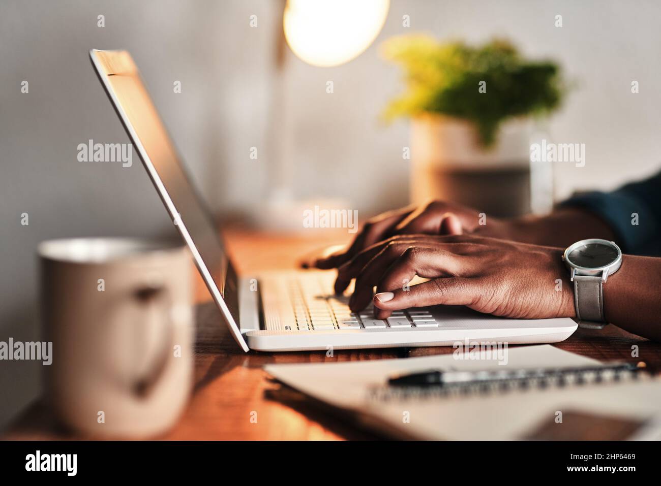 The hard work never ends. Cropped shot of an unrecognizable businessman ...